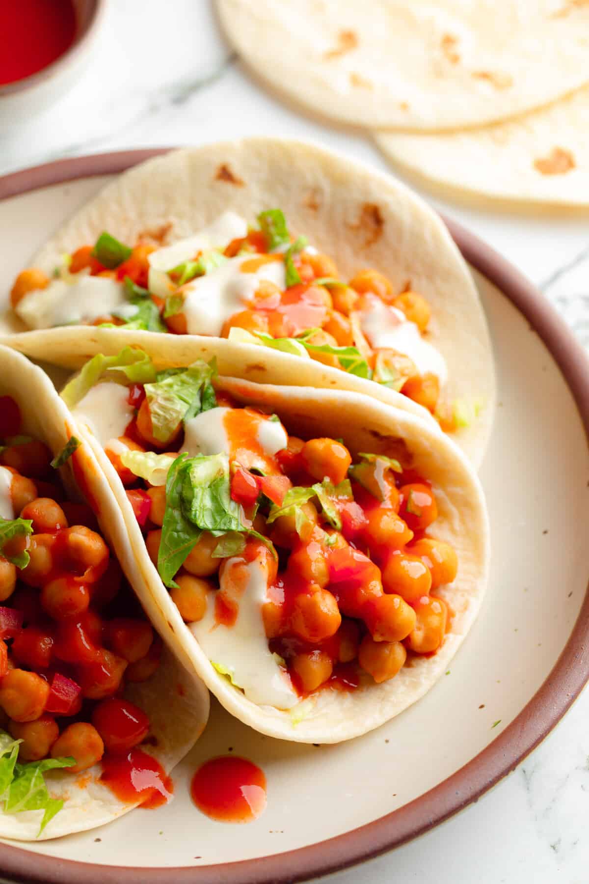 Buffalo Chickpea Tacos - Nora Cooks